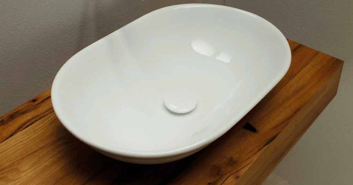 Modern design oval ceramic countertop basin Nelly, made in Italy